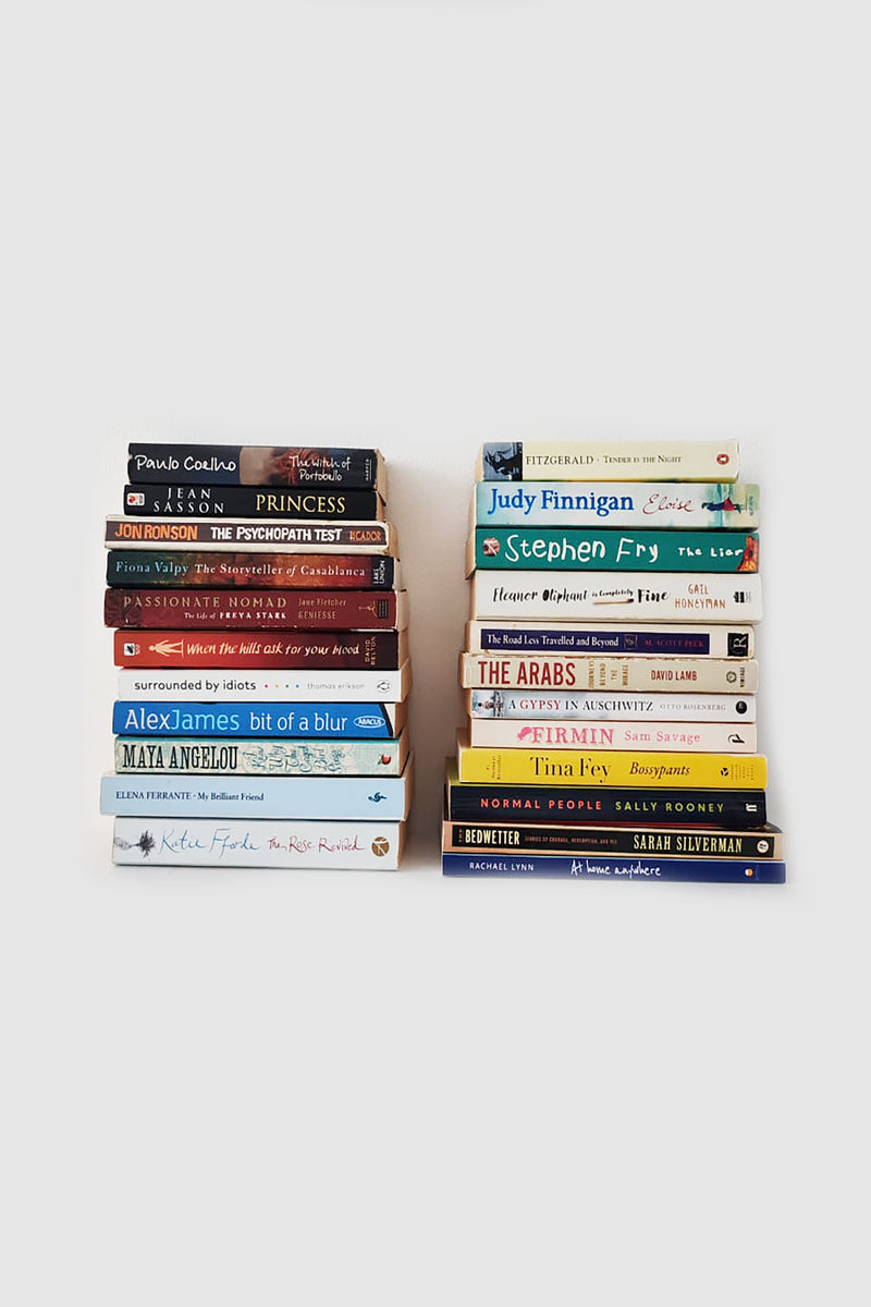 Stack of reading books (23 books) – ProppedUpRentals