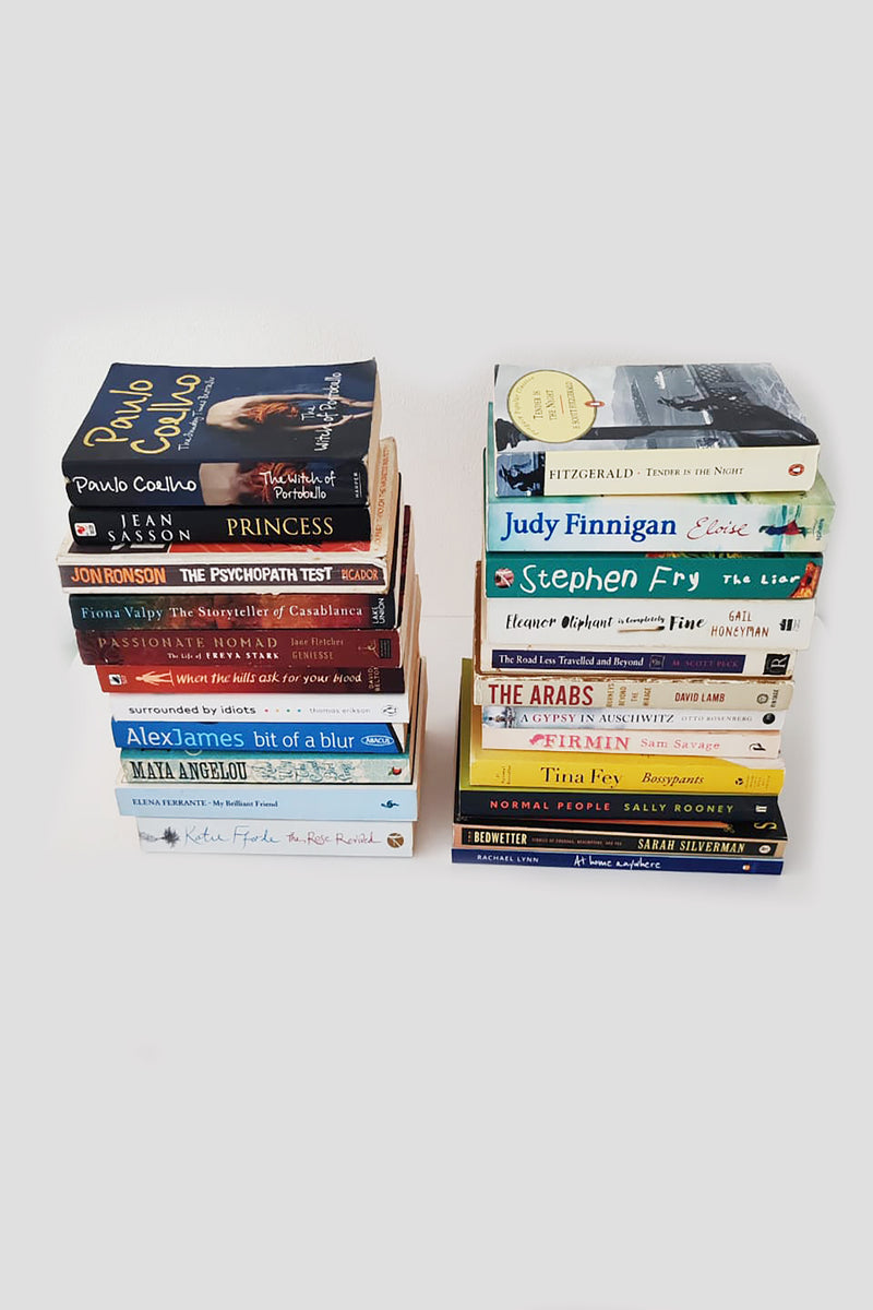 Stack of reading books (23 books) – ProppedUpRentals