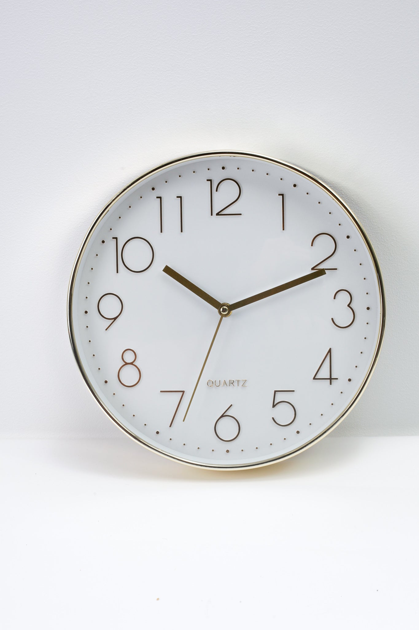 White & Gold Wall Clock – ProppedUpRentals